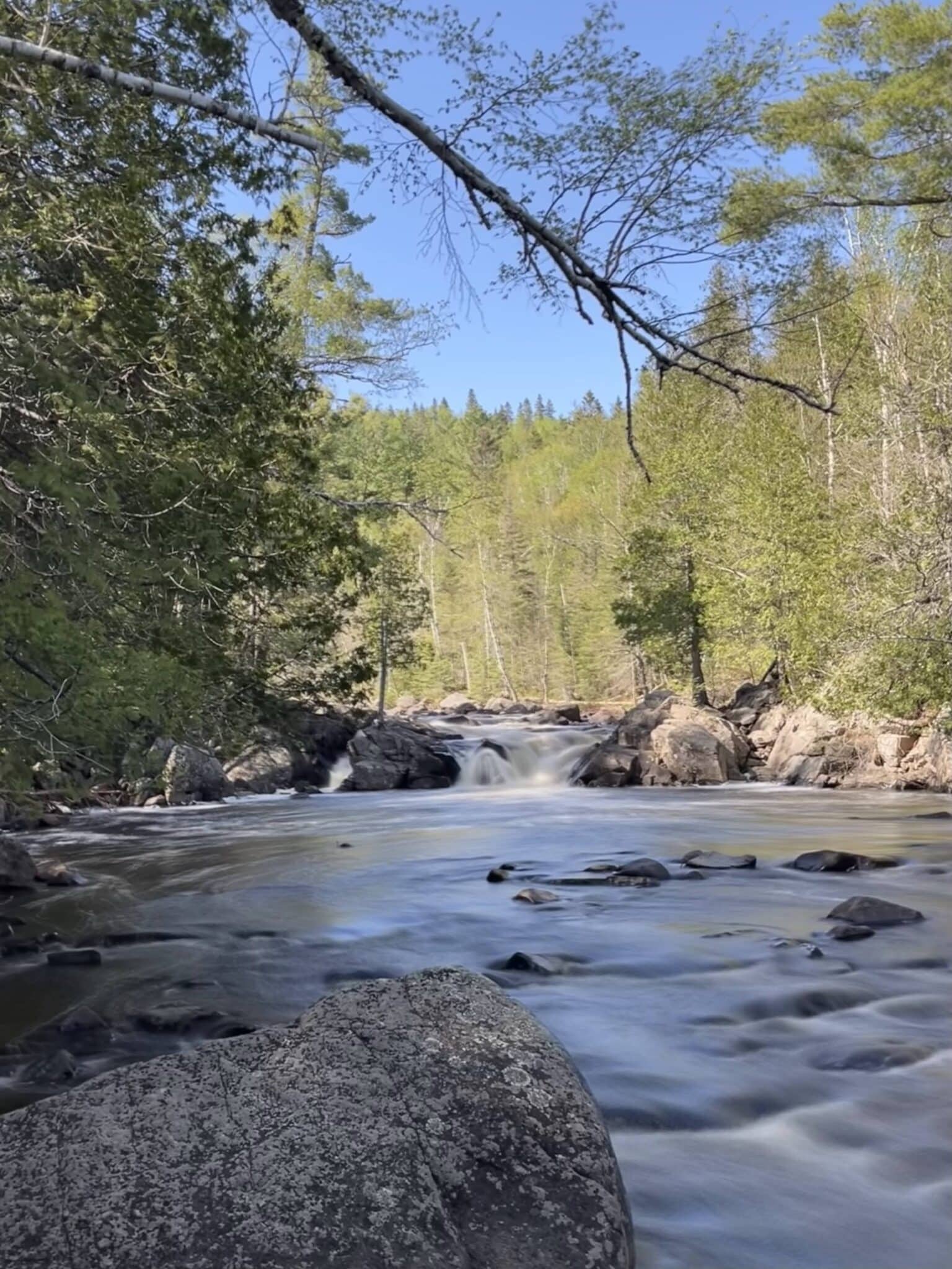 Camping next to a waterfall at George Crosby Manitou State Park